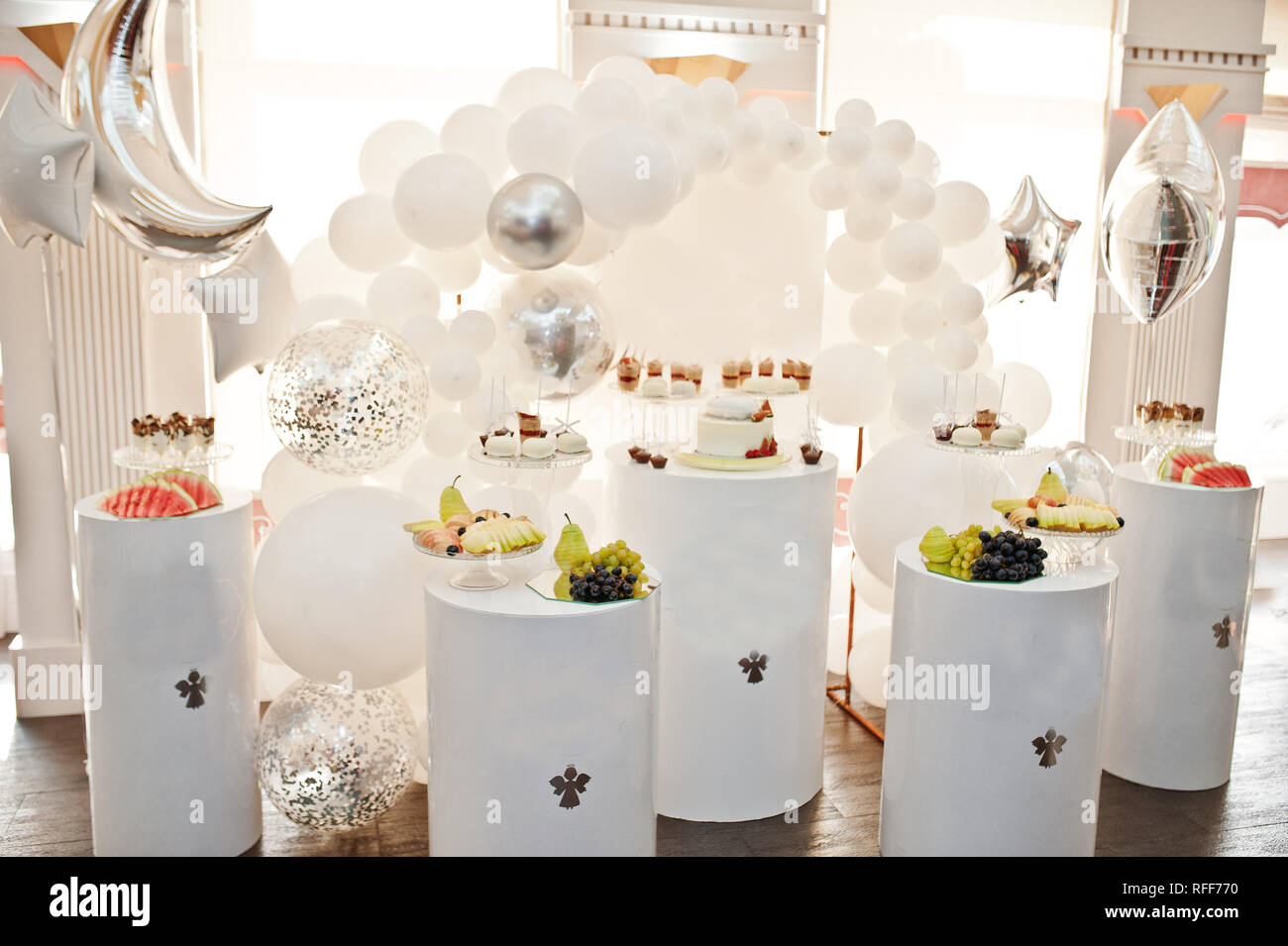 Candy bar decoration setup with delicious cakes and sweets Stock Photo ...
