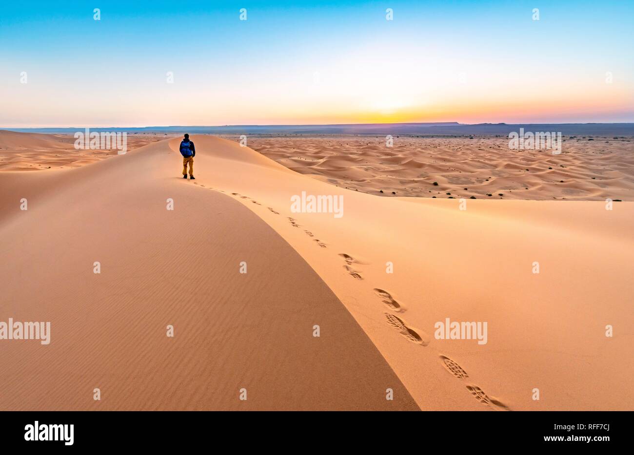 Man on the sand hi-res stock photography and images - Alamy