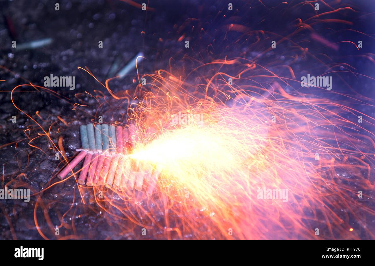 Ignited fireworks bangers and crackers Stock Photo - Alamy