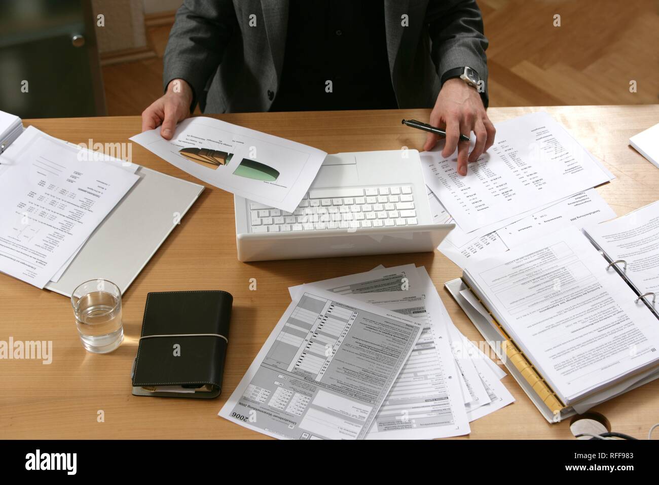 DEU, Germany : Man works in an office, at a desk Stock Photo - Alamy