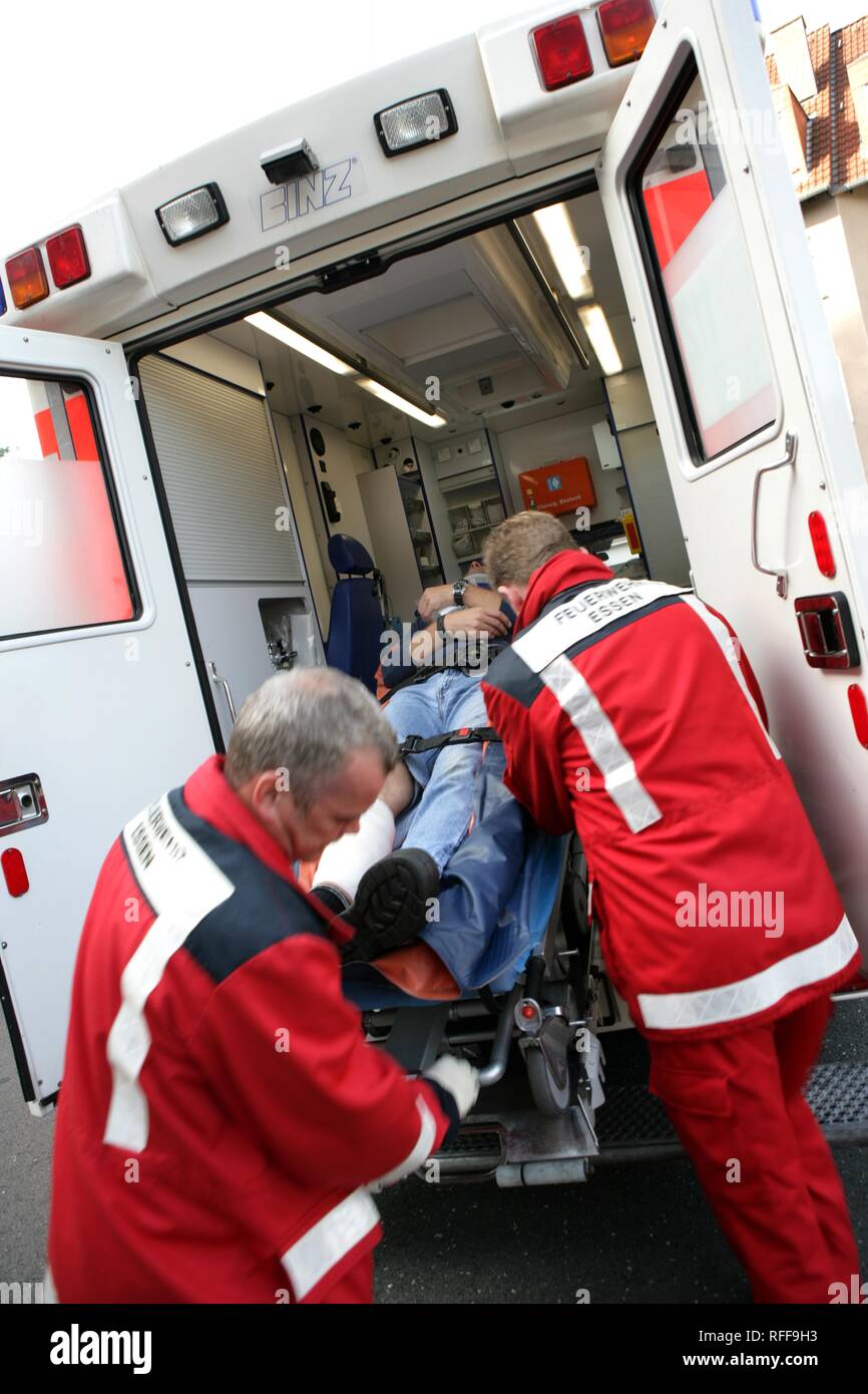 DEU Germany : Rescue paramedics first aid after an accident with a man ...