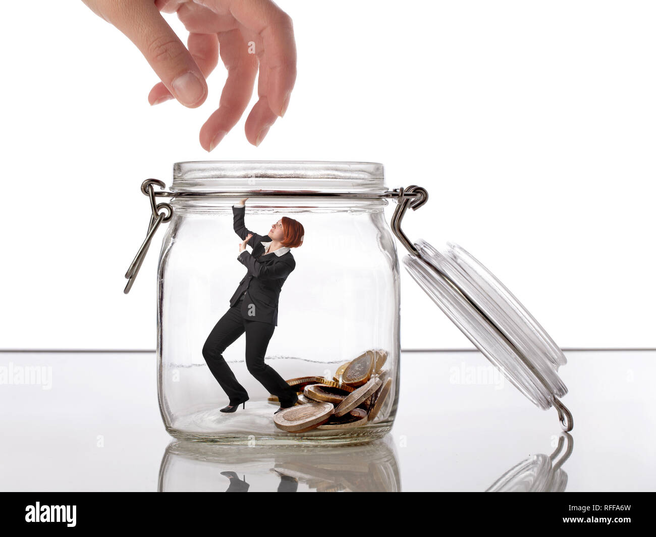 Woman protecting her savings, concept image Stock Photo - Alamy