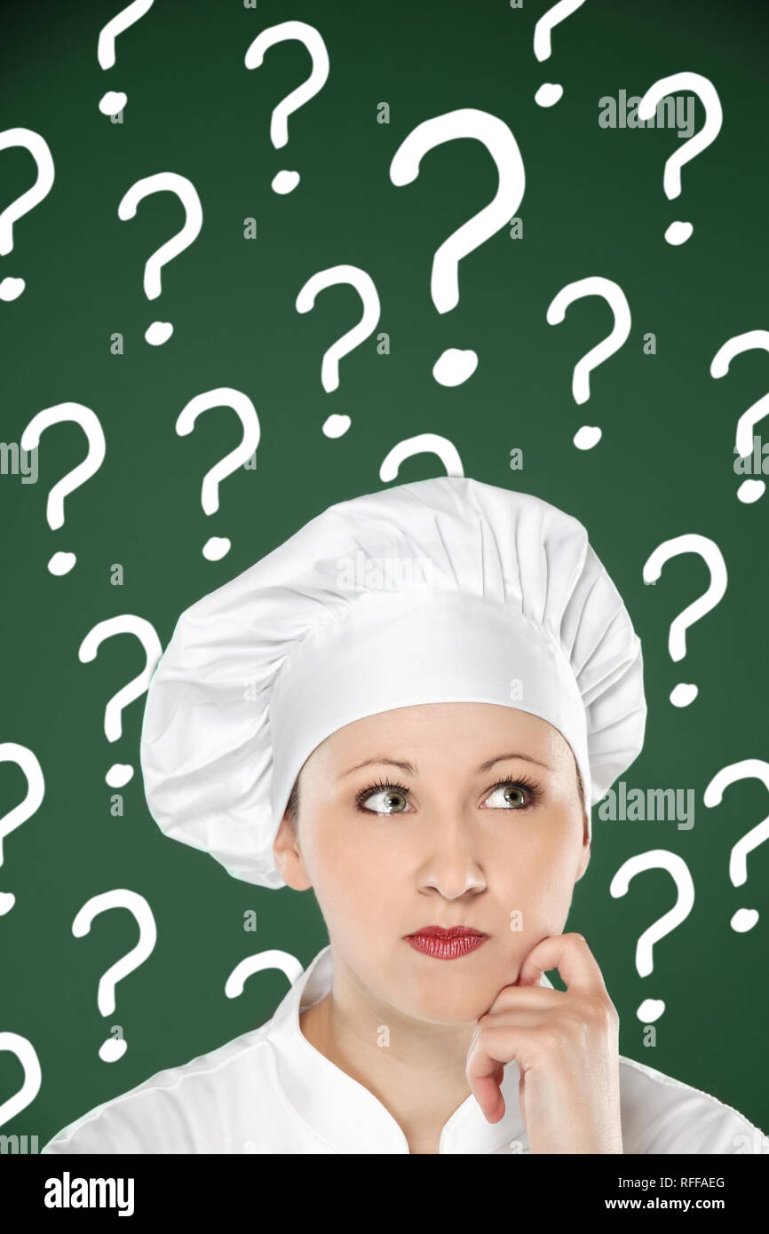 Young female chef thinking, question marks in background Stock Photo ...