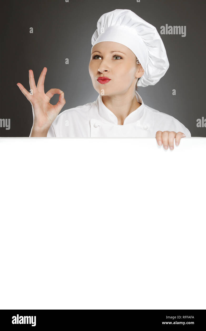 Female chef showing positive gesture with blank copy space Stock Photo ...