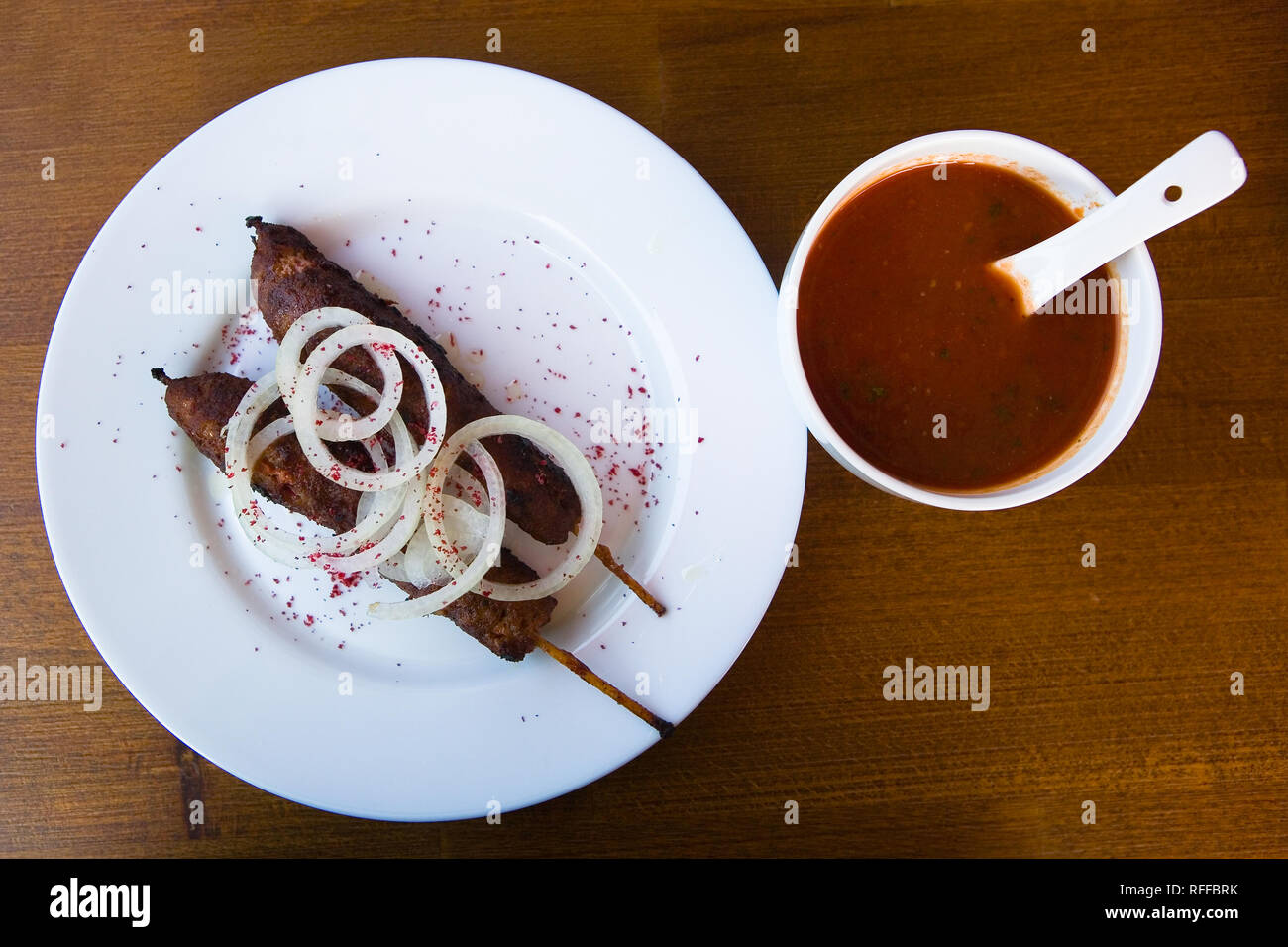 Lula kebab lie on a white plate. Food Stock Photo - Alamy