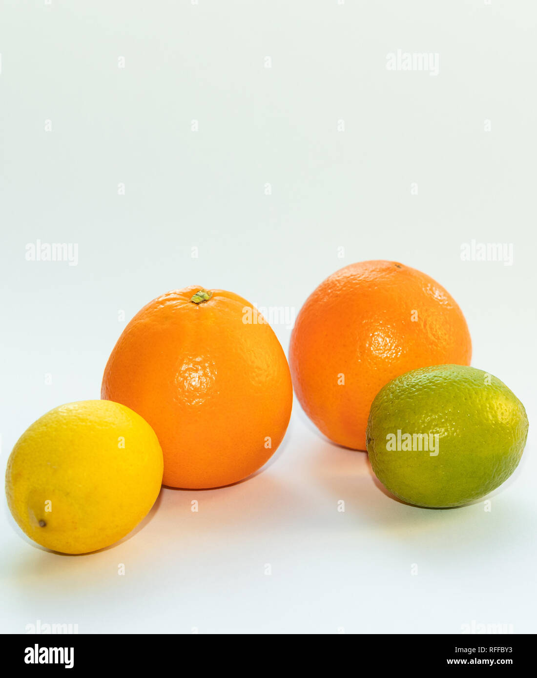 Various types of citrus isolated on white background Stock Photo - Alamy
