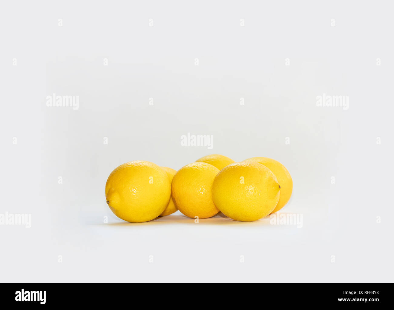 Six lemons isolated on white background Stock Photo - Alamy