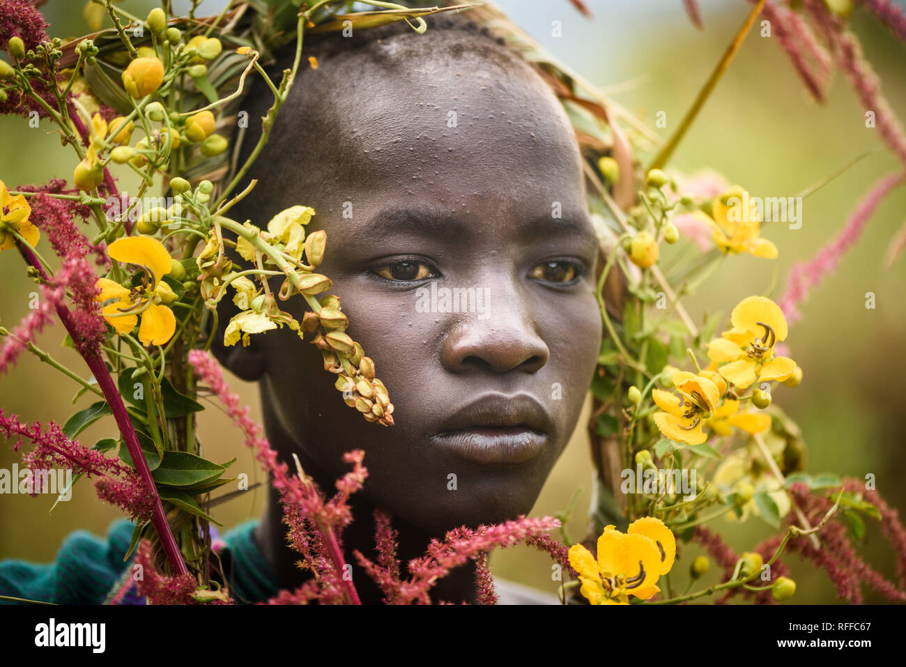 KIBISH, ETHIOPIA - AUGUST 22, 2018: unidentified woman from Surmi tribe ...
