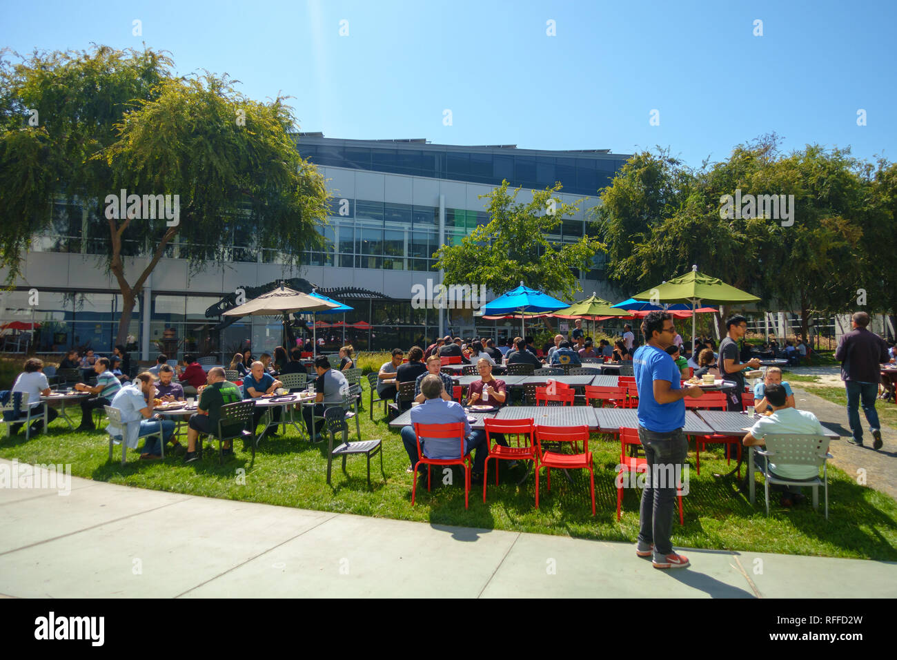Employees working outdoors at Googleplex headquarters main office Stock ...