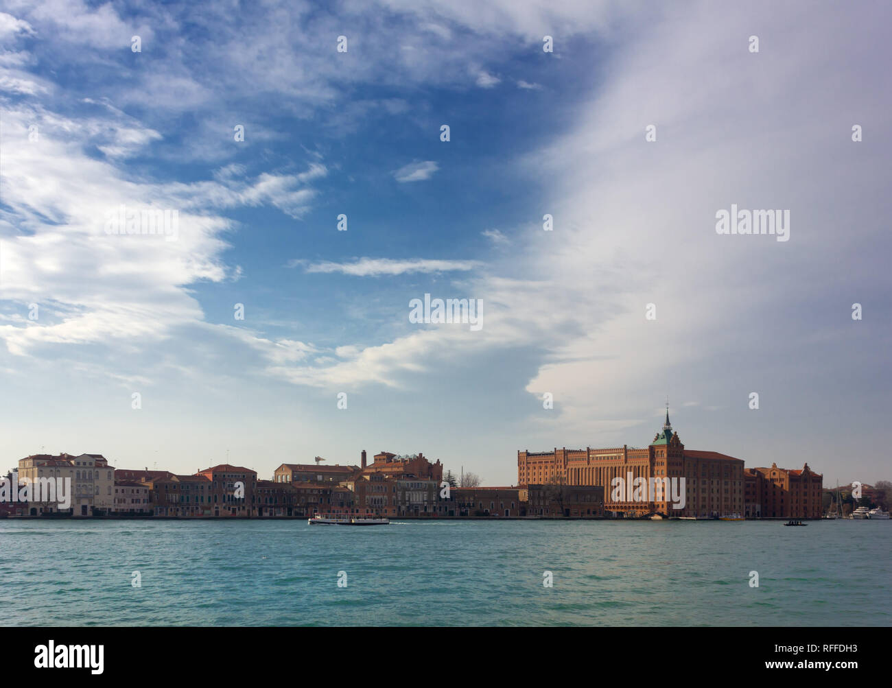 View of Giudecca island with the historic Stucky mill in Venice, Italy ...