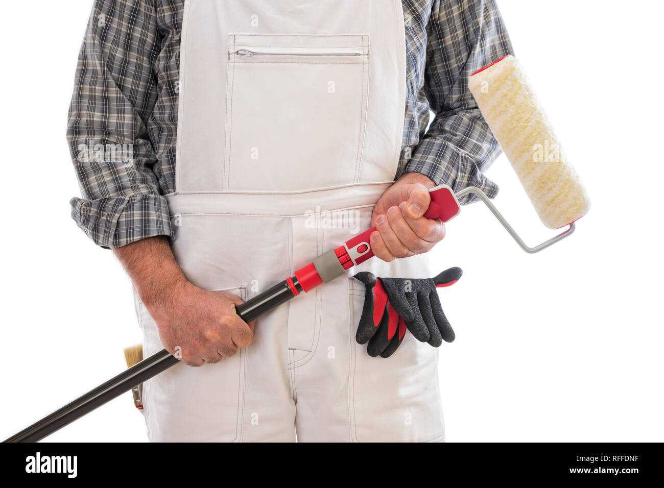 House painter worker with white work overalls, holds in his hand the ...
