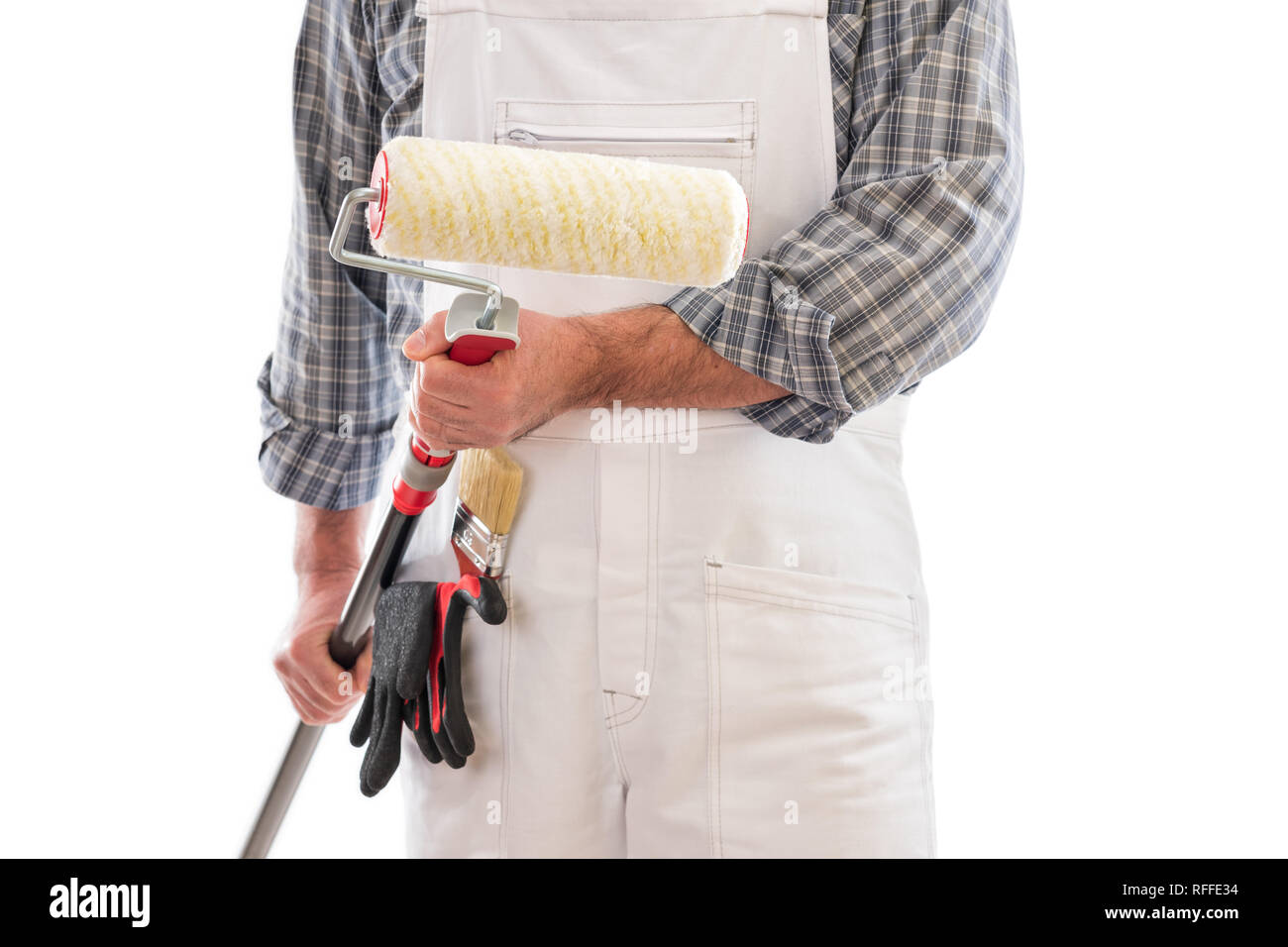 House painter worker with white work overalls, holds in his hand the ...
