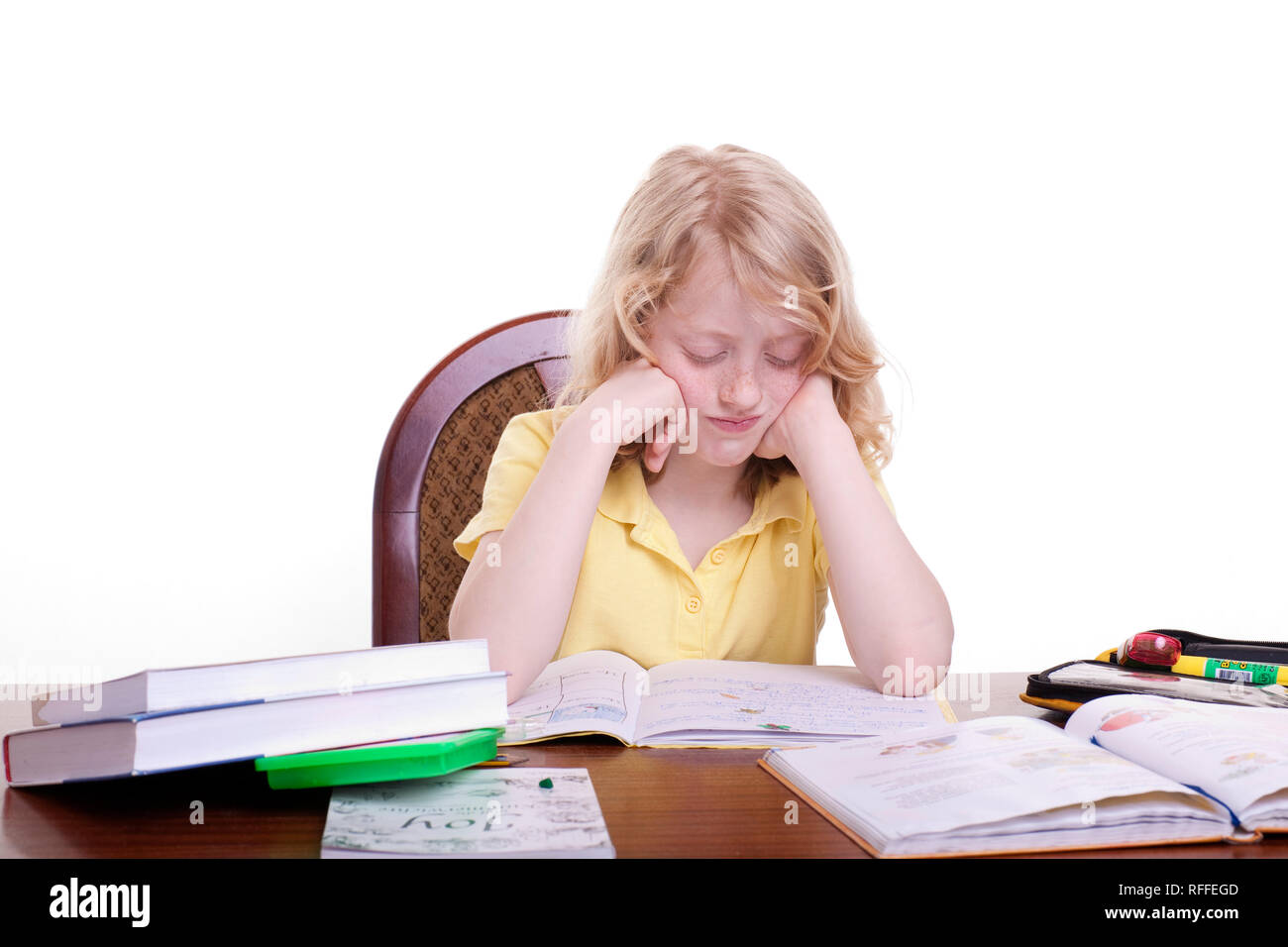 A girl stands under school stress Stock Photo - Alamy