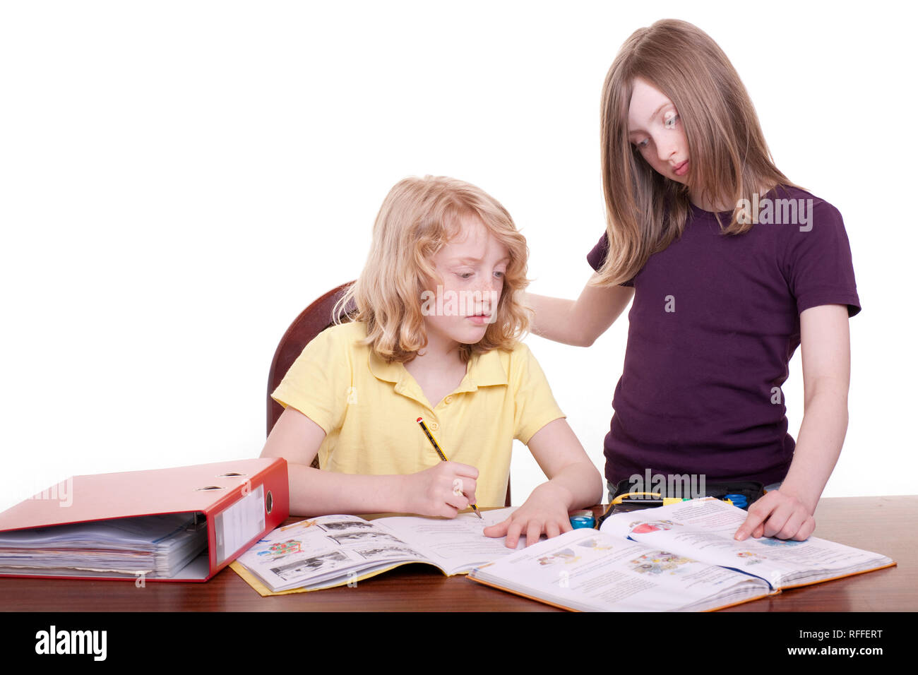 Two girls learn together Stock Photo - Alamy
