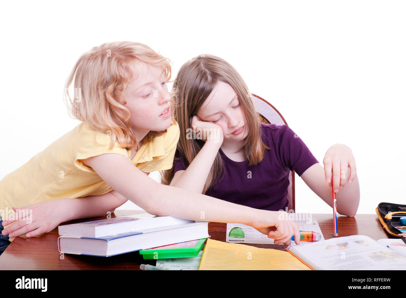 Two girls learn together Stock Photo - Alamy