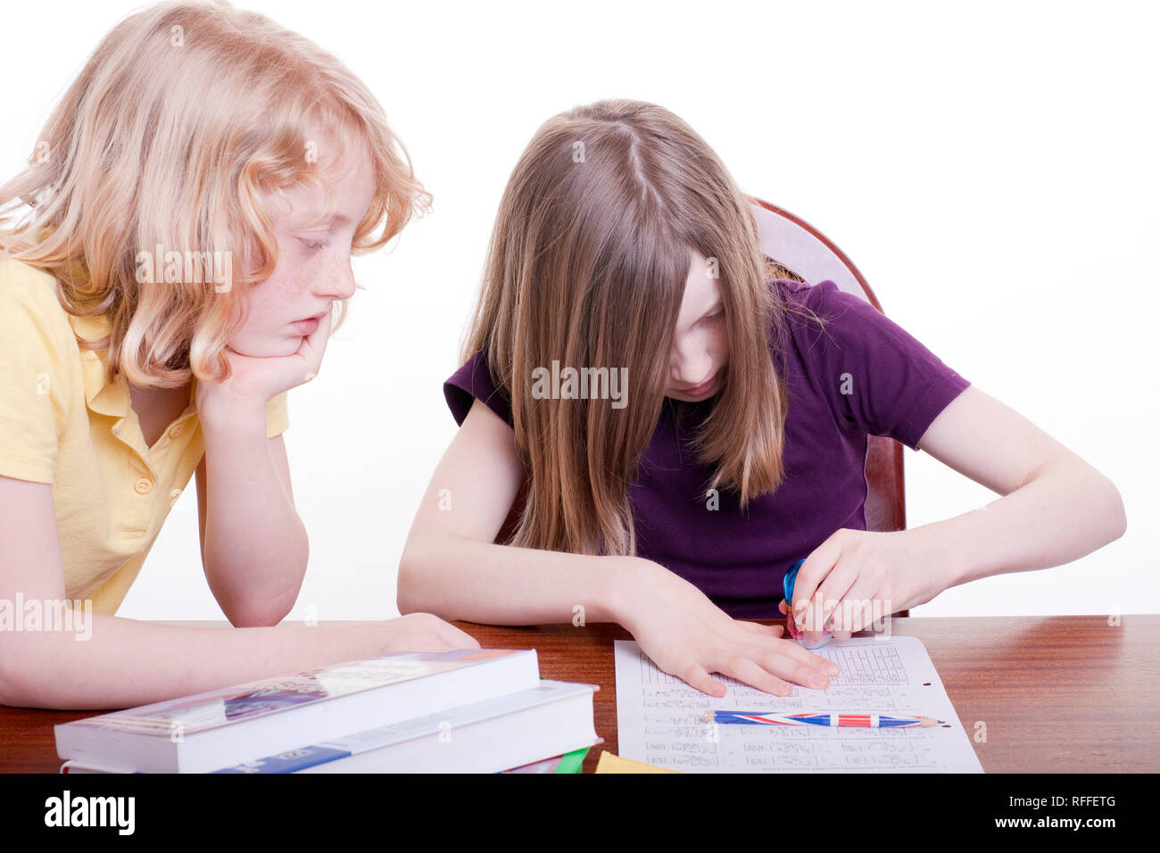 Two girls learn together Stock Photo - Alamy