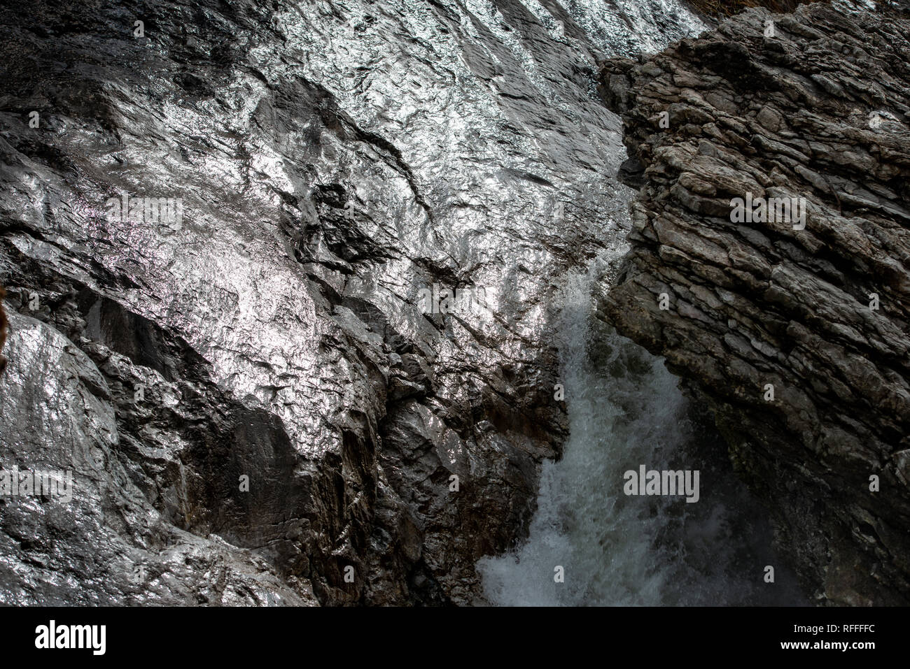 glistening rock and waterfall in the sun Stock Photo - Alamy