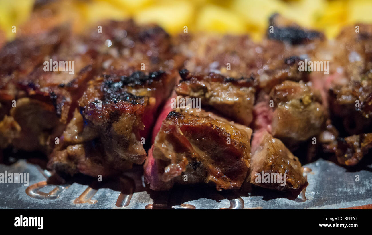Grilled beef rib with chips Stock Photo - Alamy