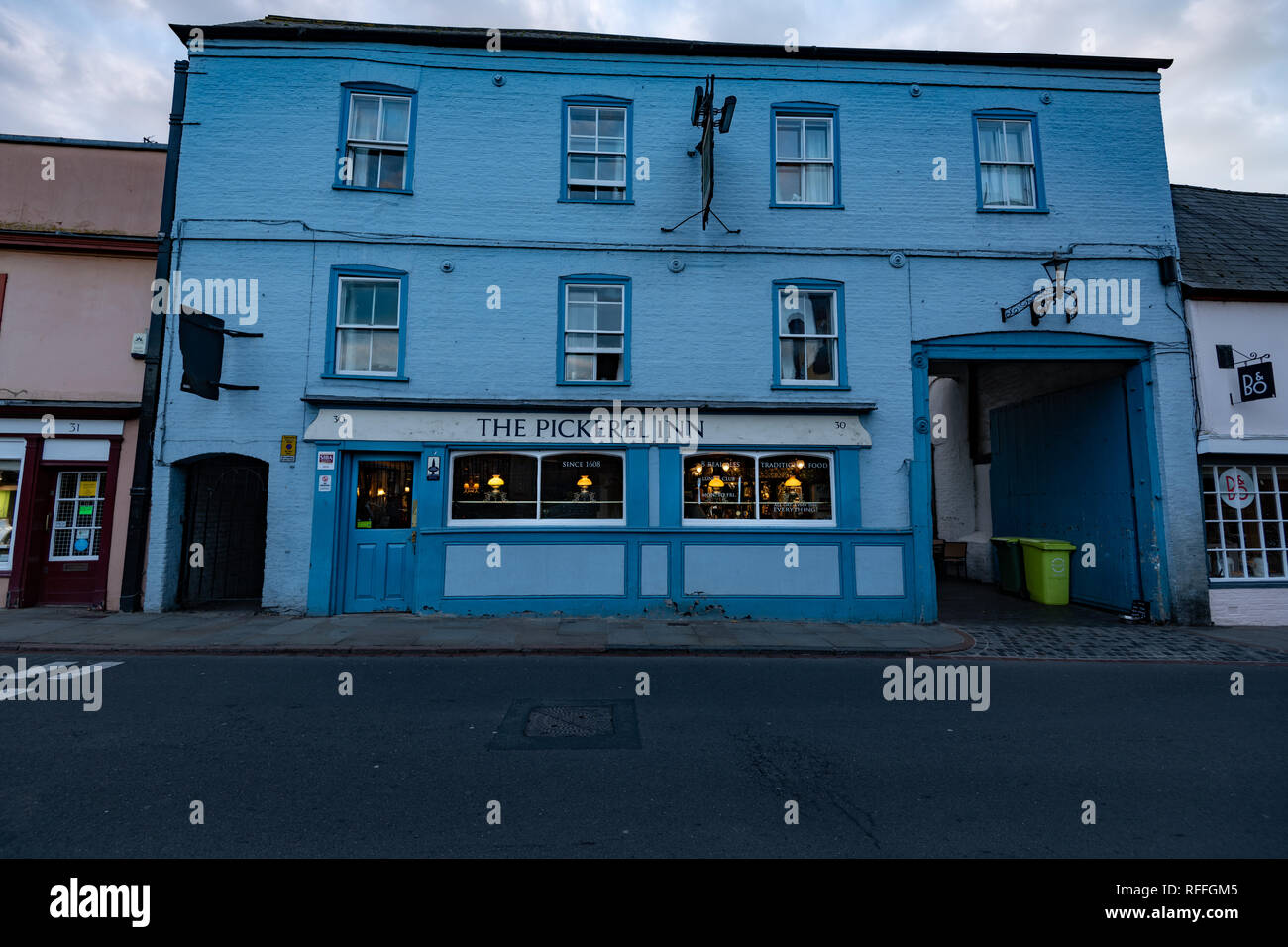 An unusual blue pub in Cambridge town center at sunset Stock Photo - Alamy
