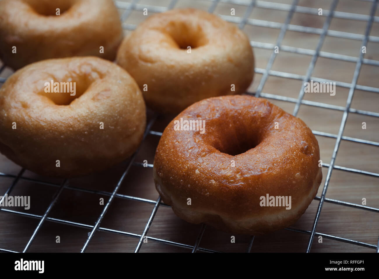 Cooling donut on white mesh Stock Photo - Alamy