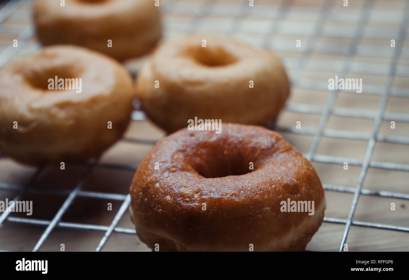 Cooling donut on white mesh Stock Photo - Alamy