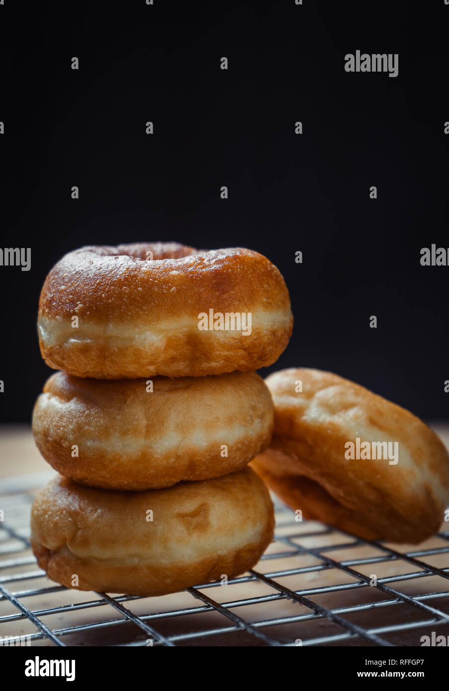 Cooling donut on white mesh Stock Photo - Alamy