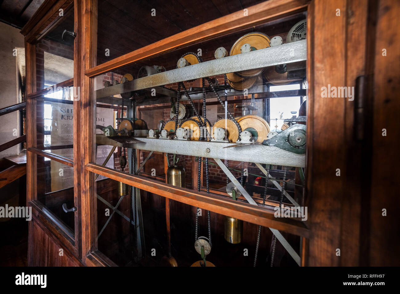 Poland, Krakow, wheels and chains of old clock mechanism in the Town ...