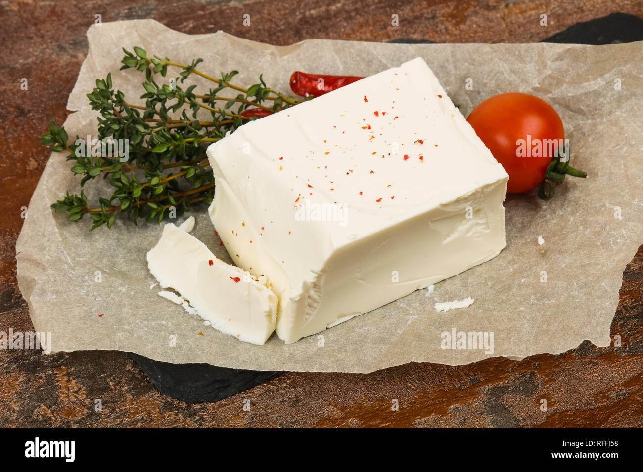 Traditional Feta Cheese served thyme Stock Photo - Alamy