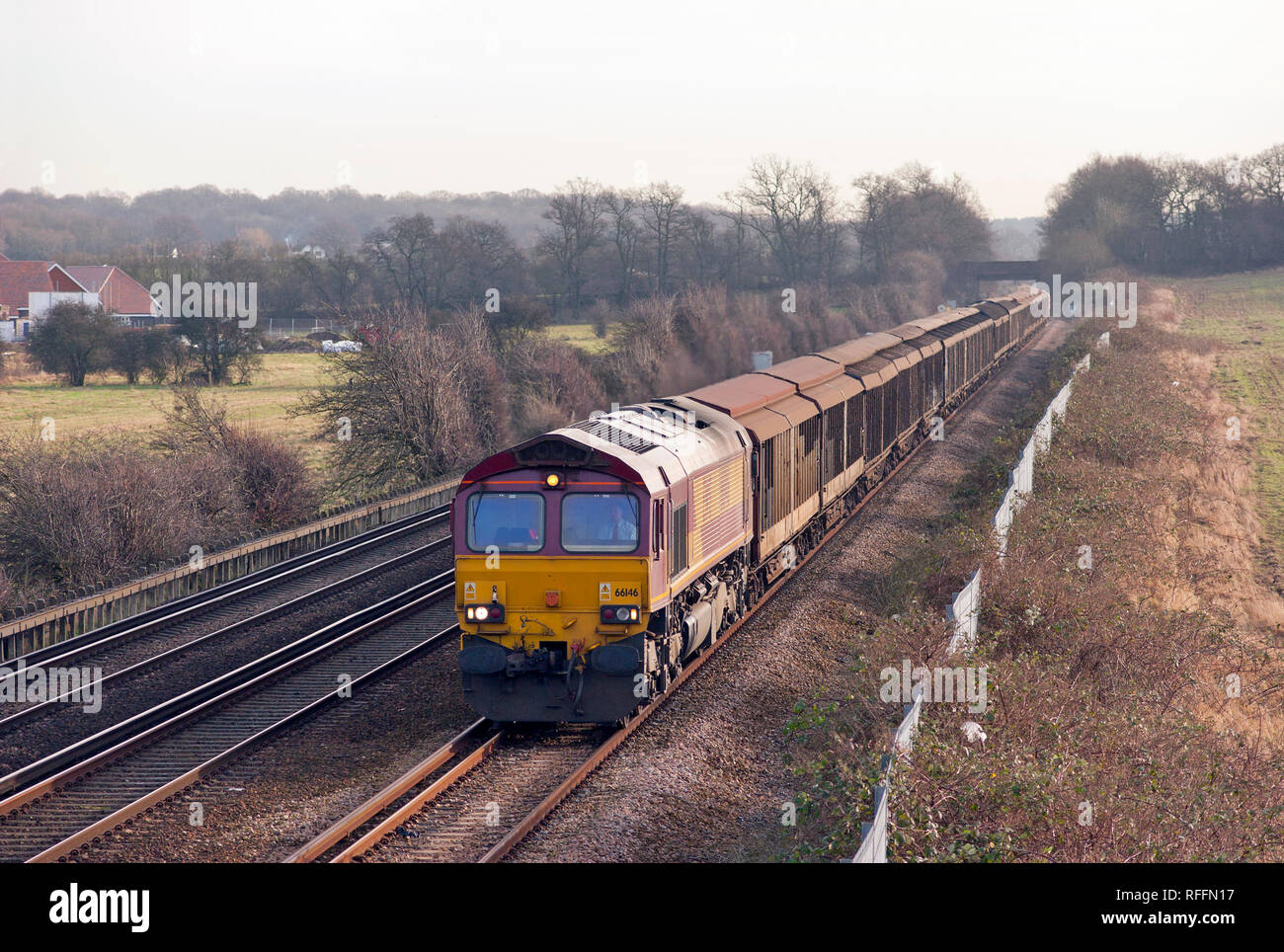 A class 66 diesel locomotive number 66146 working a freight train of ...