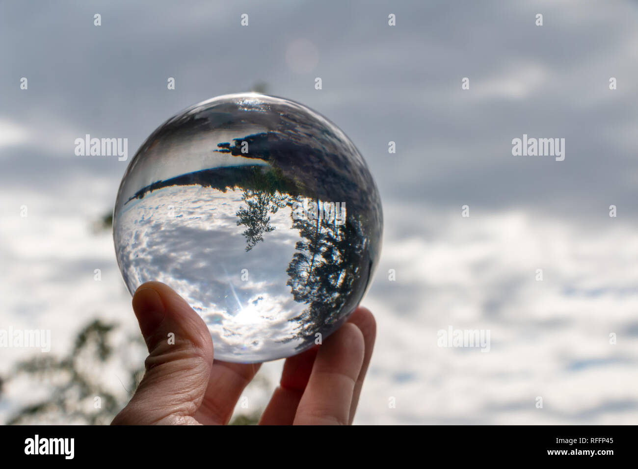 Hand holding crystal hi-res stock photography and images - Alamy