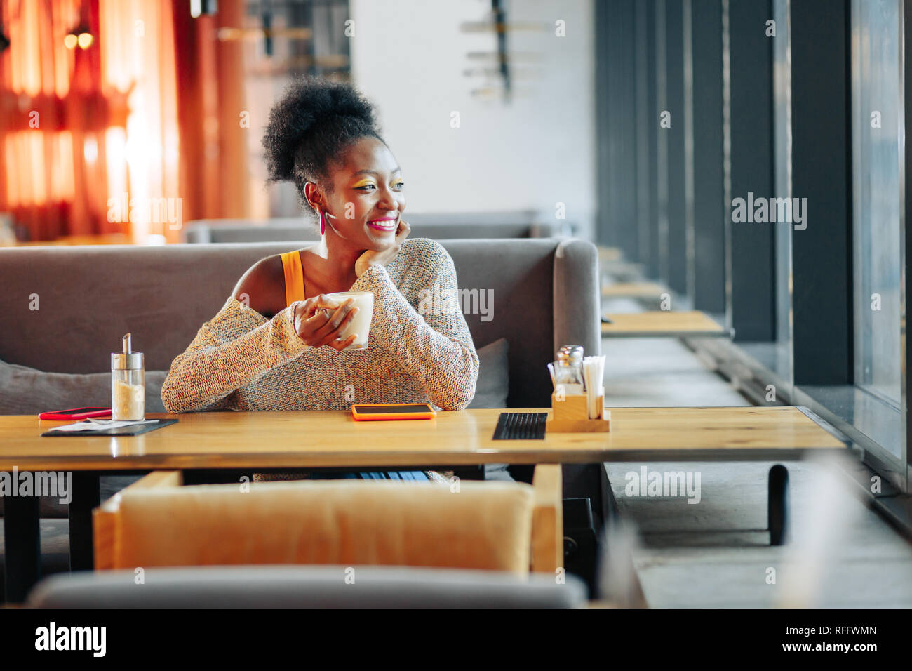 Beautiful girlfriend drinking coffee while waiting for her man Stock ...
