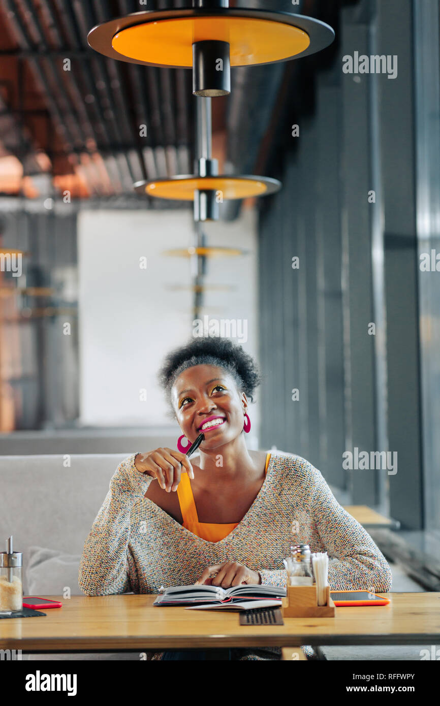 Curly student feeling thoughtful getting ready for presentation Stock ...