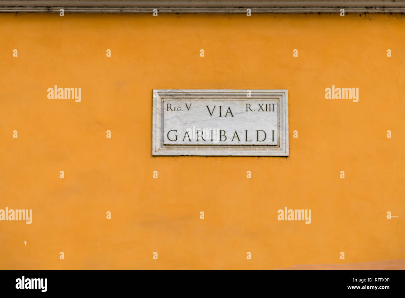 ROME, ITALY - JANUARY 2, 2019: light is enlightening street name sign ...