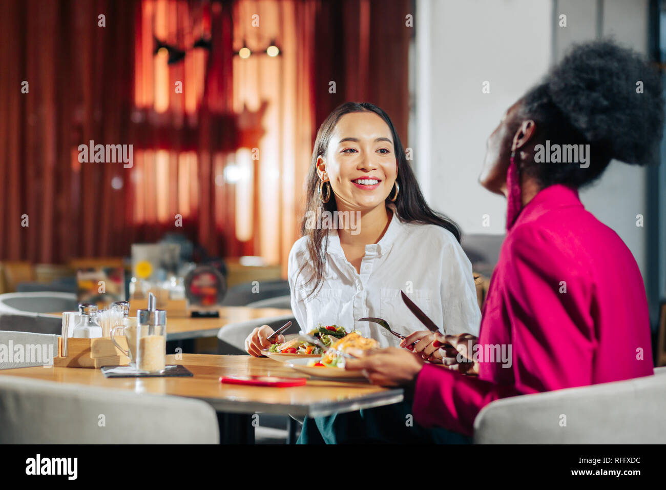 Colleagues having fun during coffee hi-res stock photography and images ...