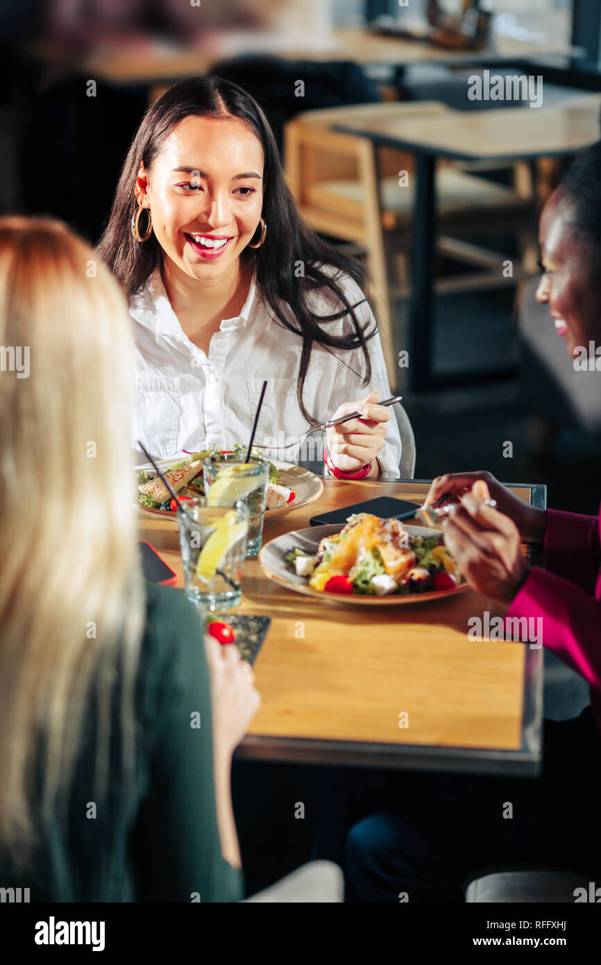 Three colleagues having dinner together after hard working day Stock ...