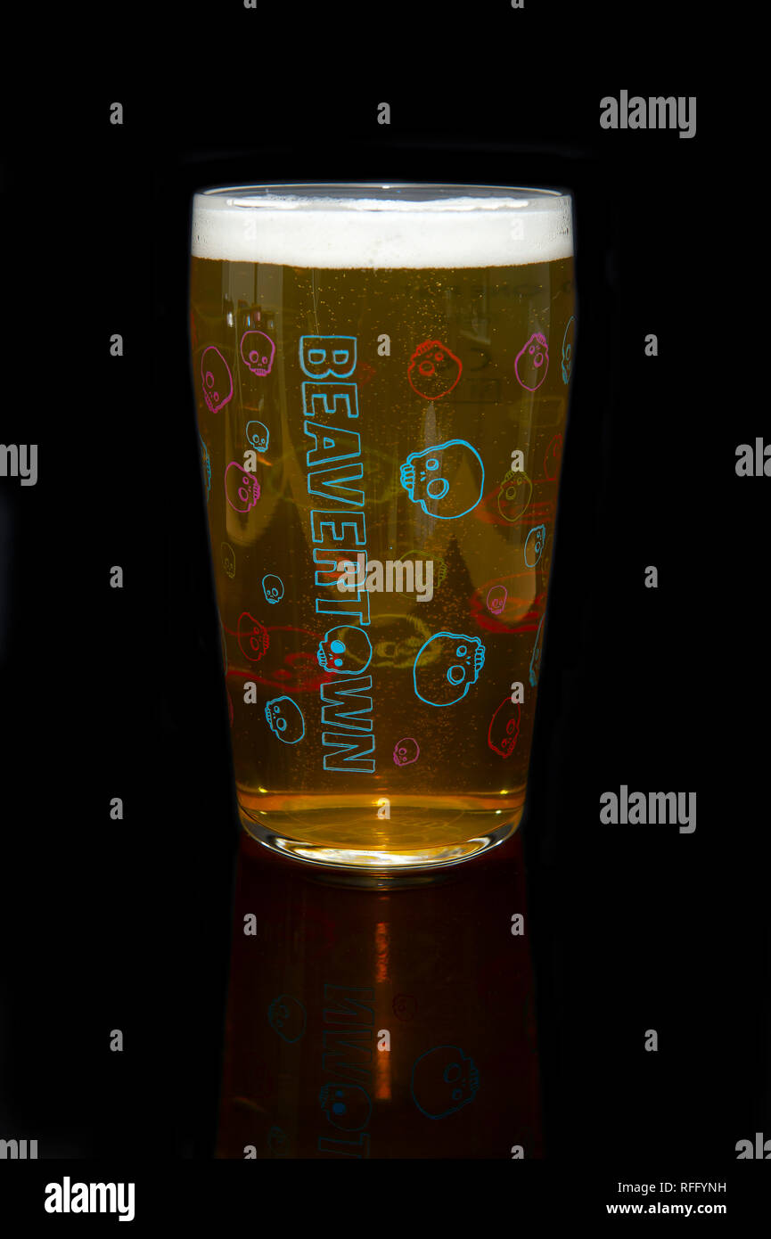 Beavertown IPA Beer in a Beavertown Pint Glass Stock Photo - Alamy