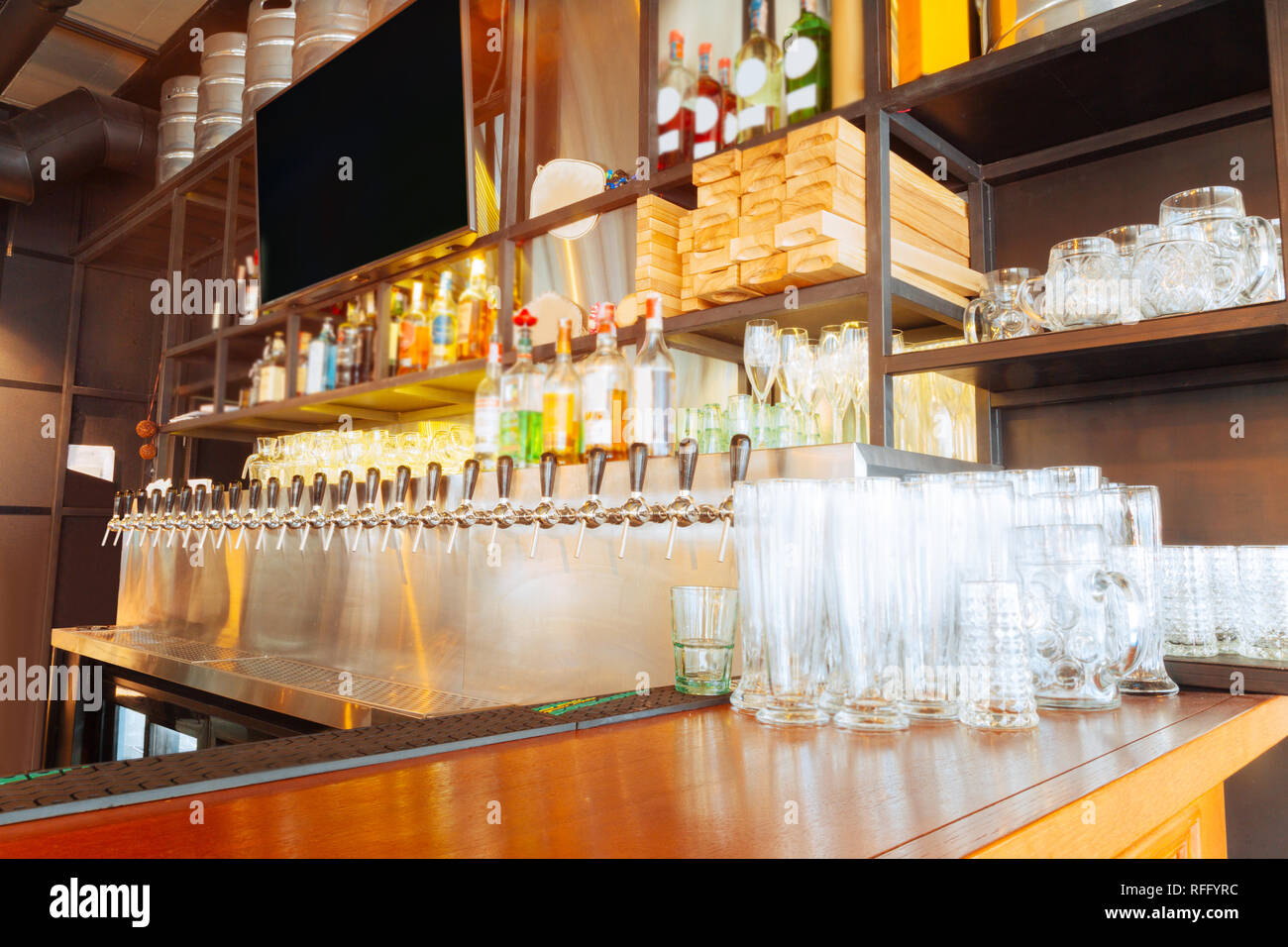Big clean glasses standing empty of nice wooden bar stand Stock Photo ...