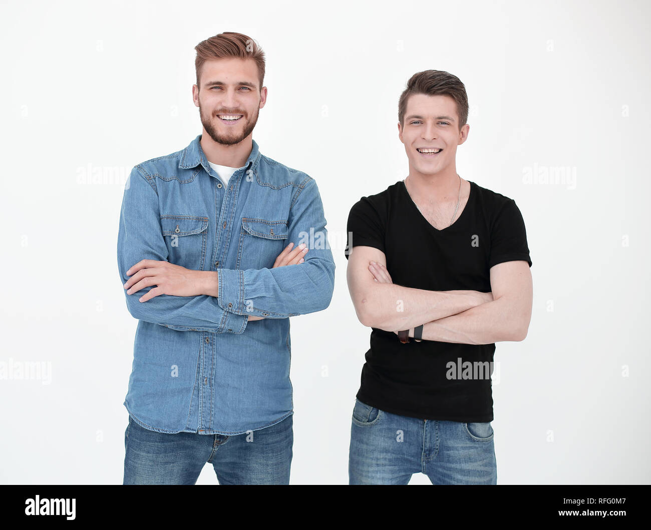 Two happy guys laughing standing hi-res stock photography and images ...