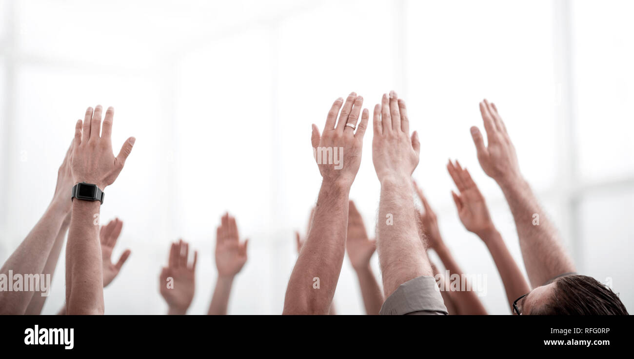 business background.the business team stands with their hands up Stock ...