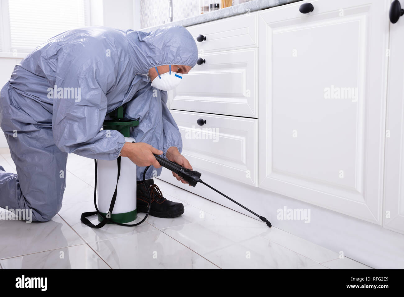 Human hand spraying insecticide hi-res stock photography and images - Alamy