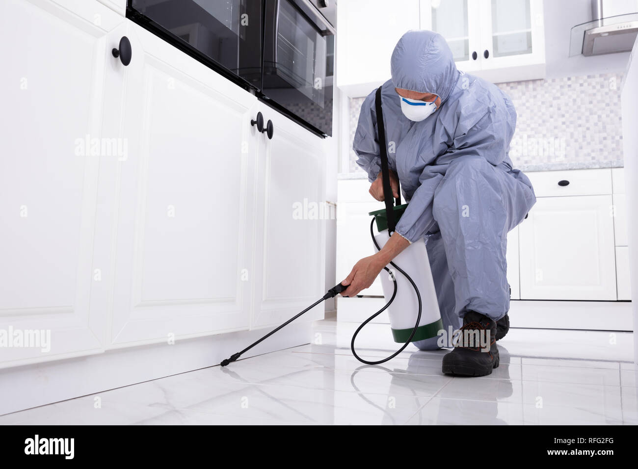 Hand insecticide spray hi-res stock photography and images - Alamy