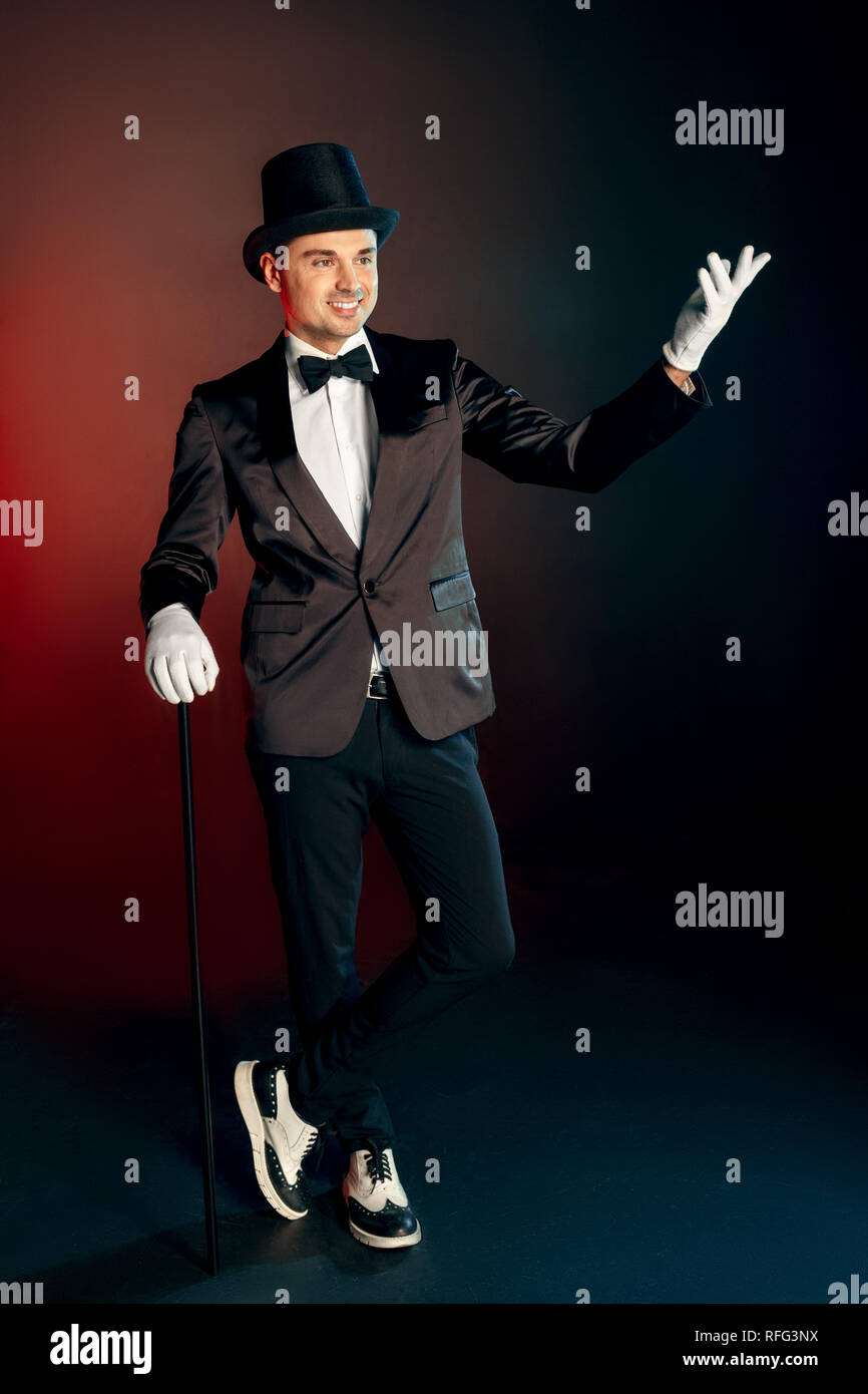Professional Occupation. Showman in suit gloves and hat standing ...