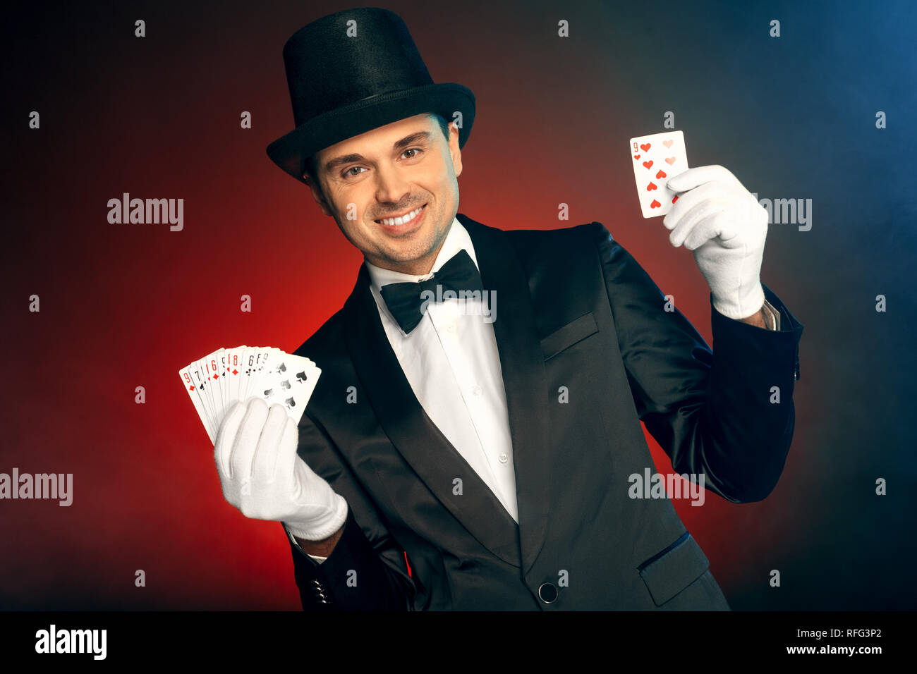 Male magician in black suit hi-res stock photography and images - Alamy