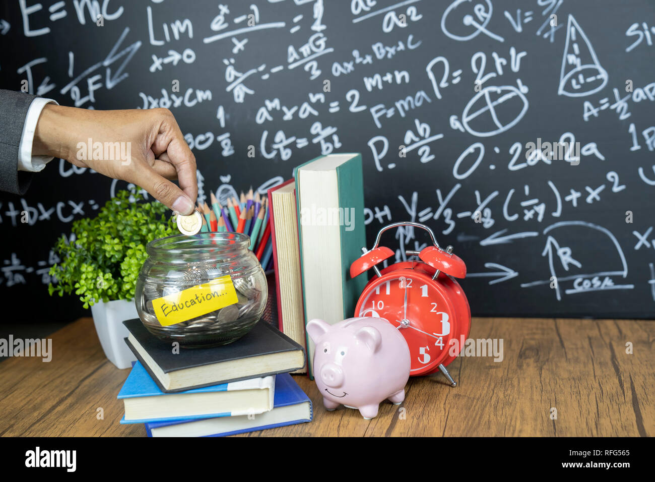 Money for study hi-res stock photography and images - Alamy