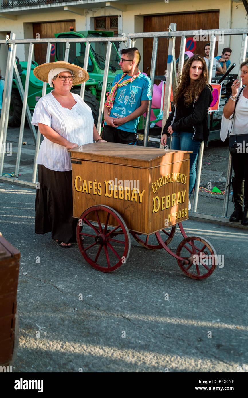 French lady pushing trolley with coffee in Old School Parade of ...