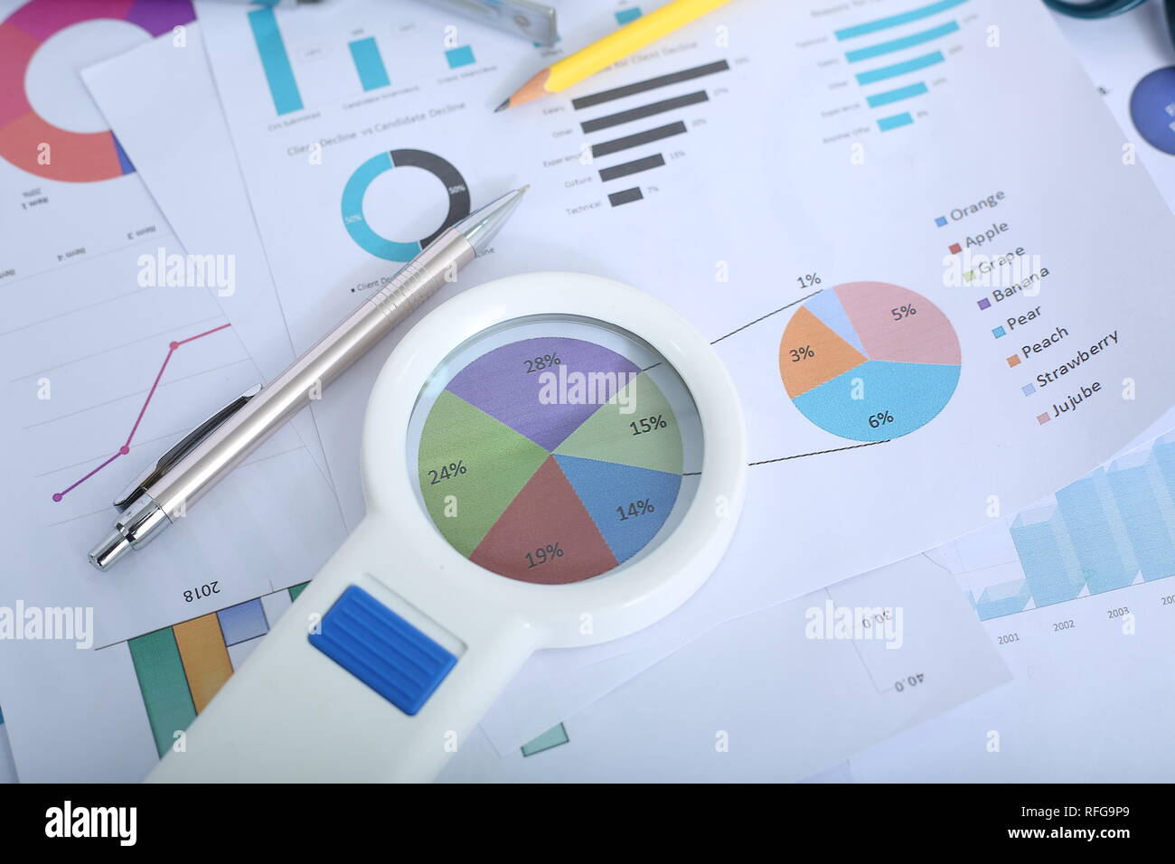 Picture of pen, stapler and pencil on the office paper Stock Photo - Alamy