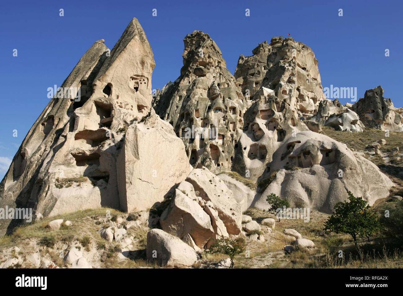 Fairy chimney rock formations, rooms in artificial caves, Uchisar ...