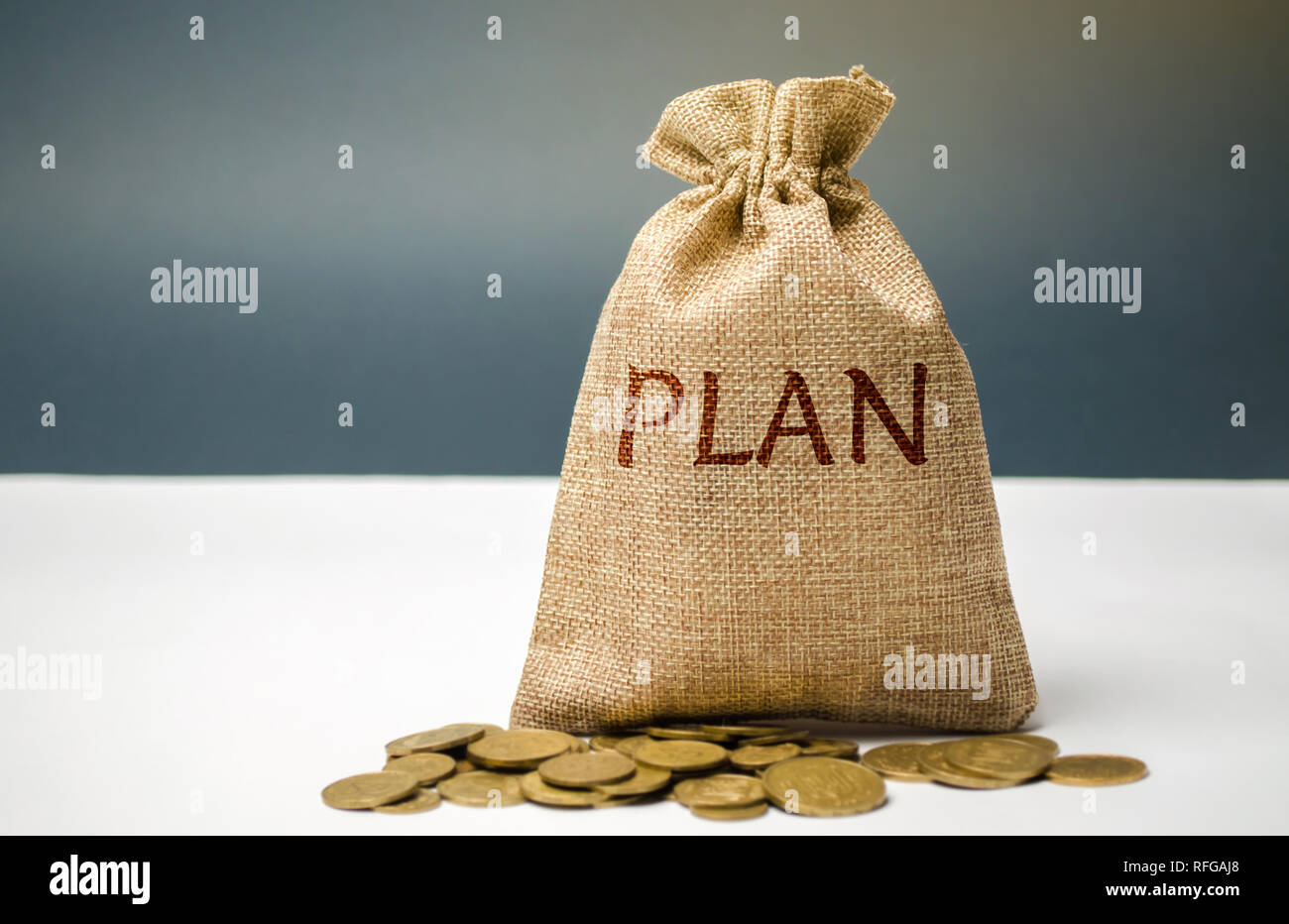 Money bag with coins and the word Plan. Personal financial planning ...