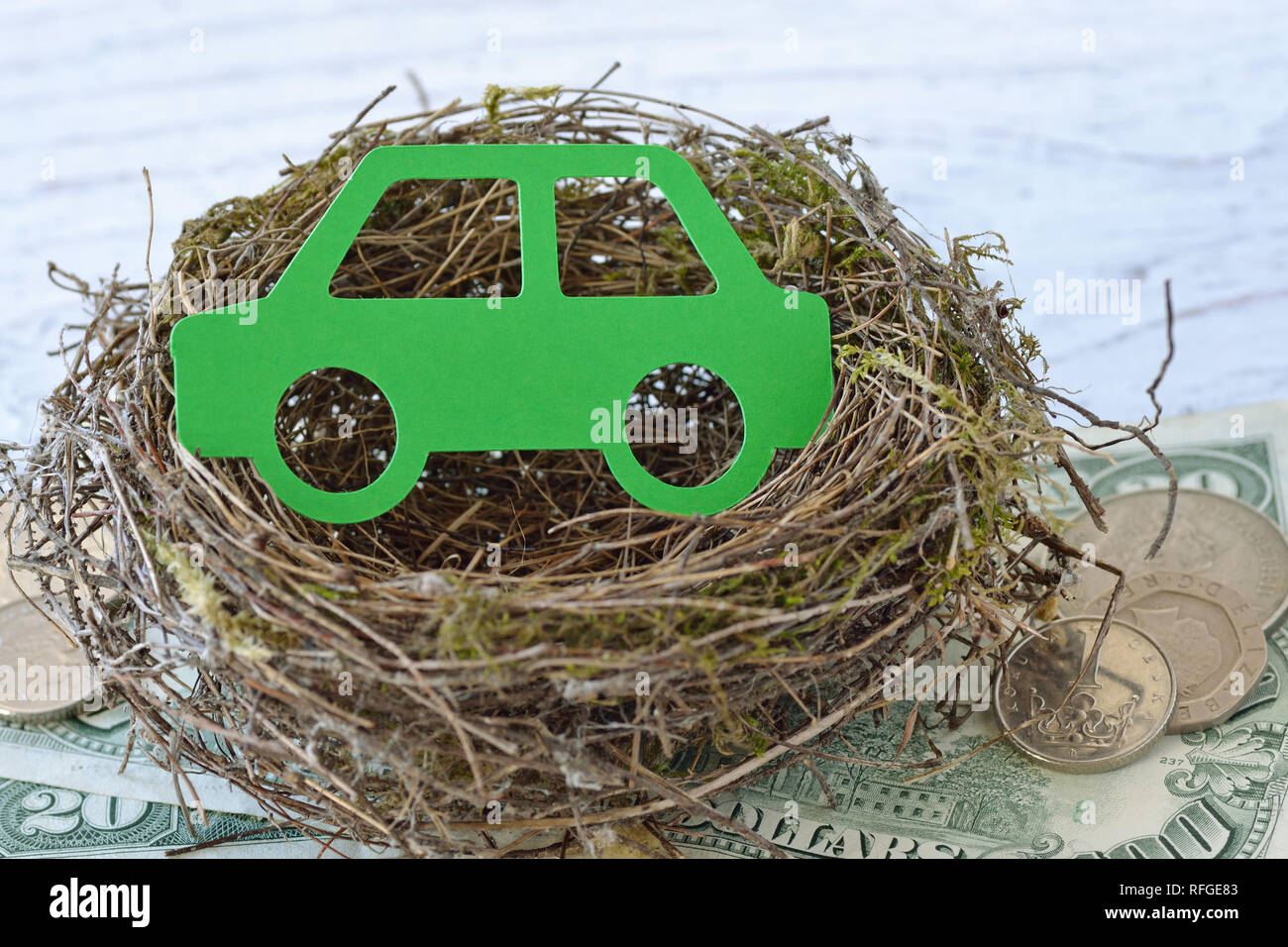 Paper car in nest on money background - Car insurance concept Stock ...