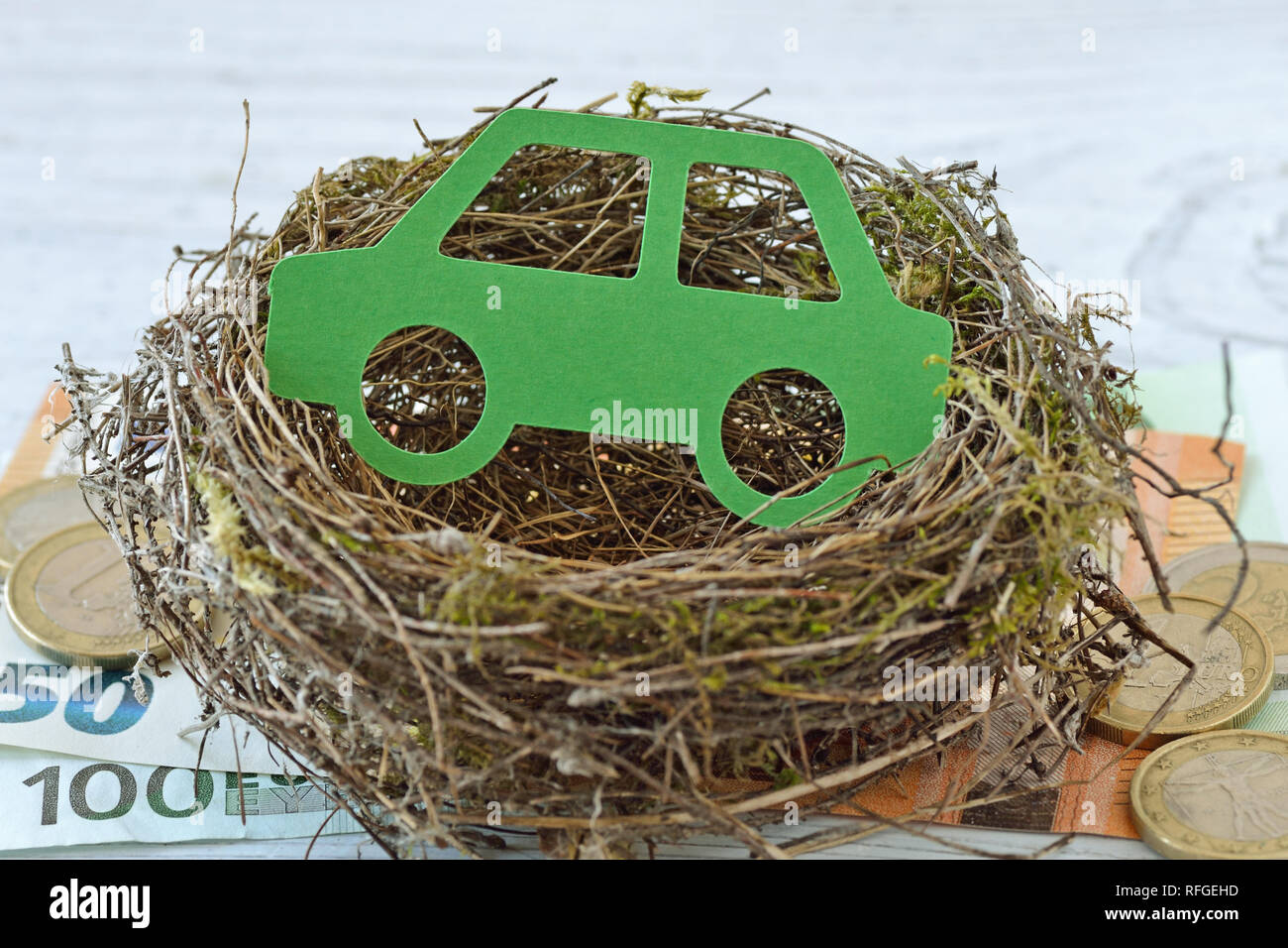 Paper car in nest on money background - Car insurance concept Stock ...